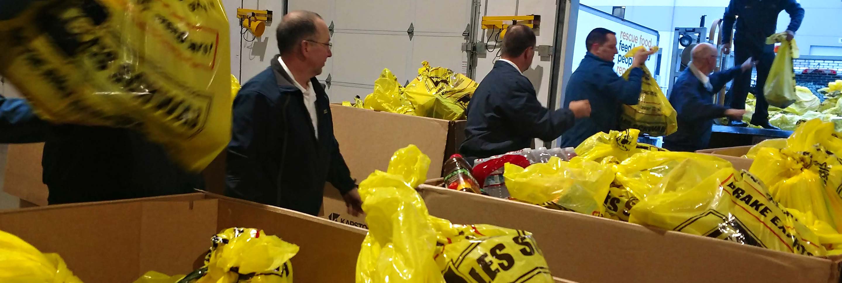 Delivering Six Pickup Loads of Food for Local Cause - Les Schwab